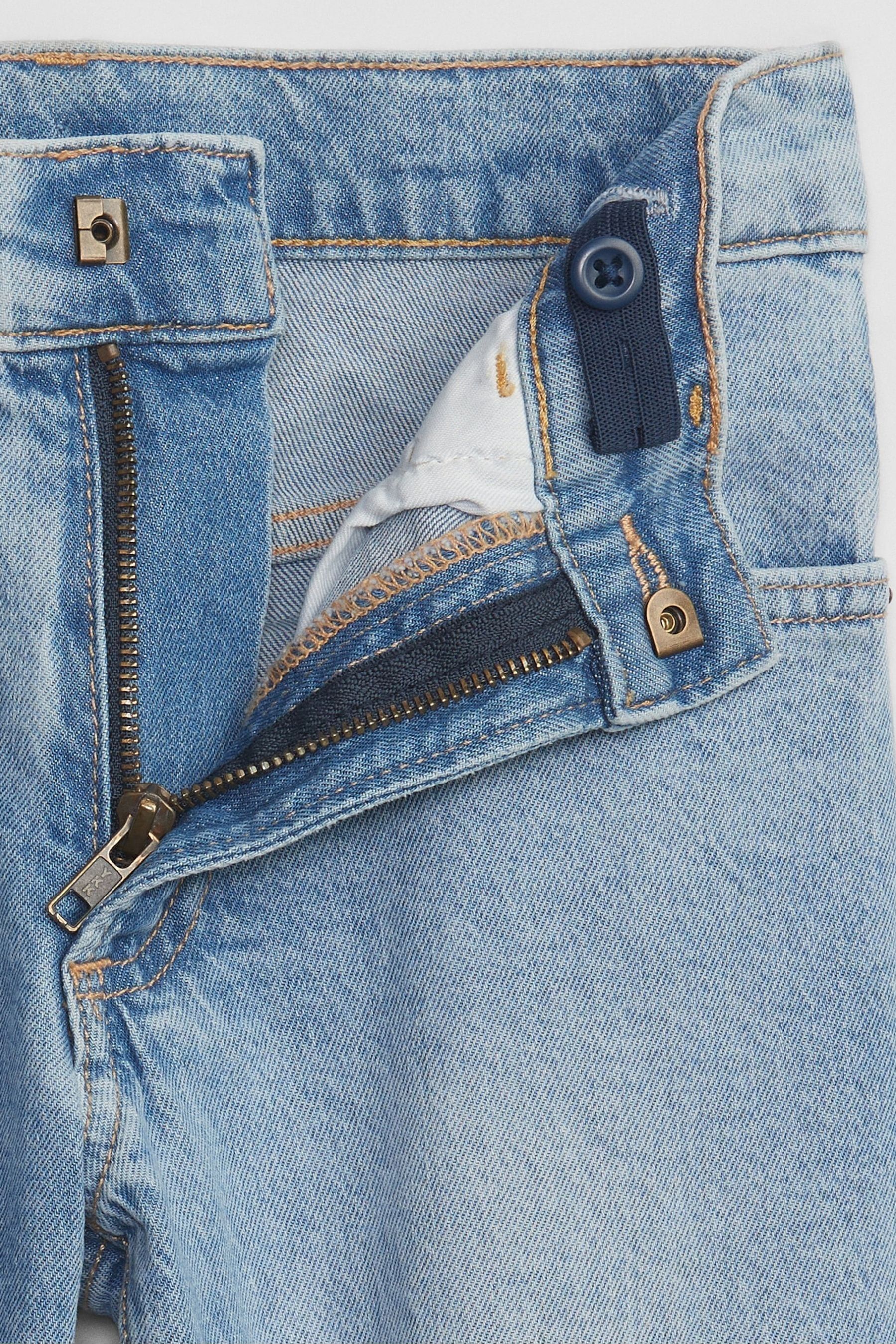 Buy Light Wash Blue Slim Tapered Jeans from the Gap online shop