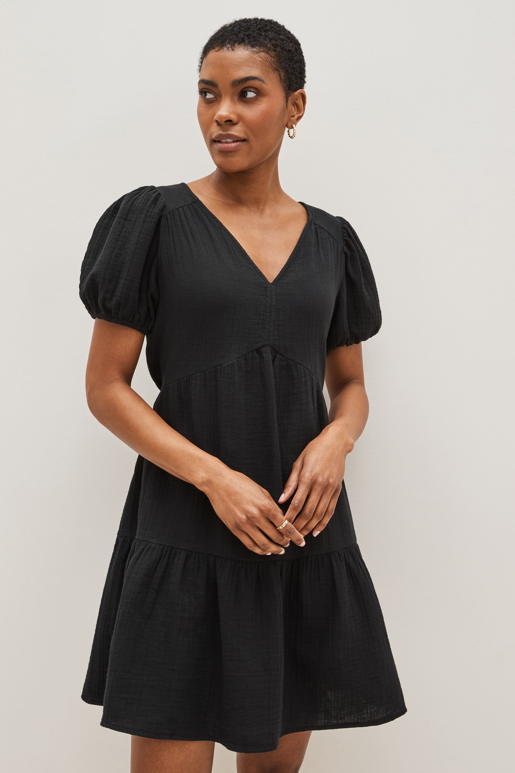 Buy Black Crinkle Gauze Puff Sleeve Tiered Mini Dress from the Gap ...