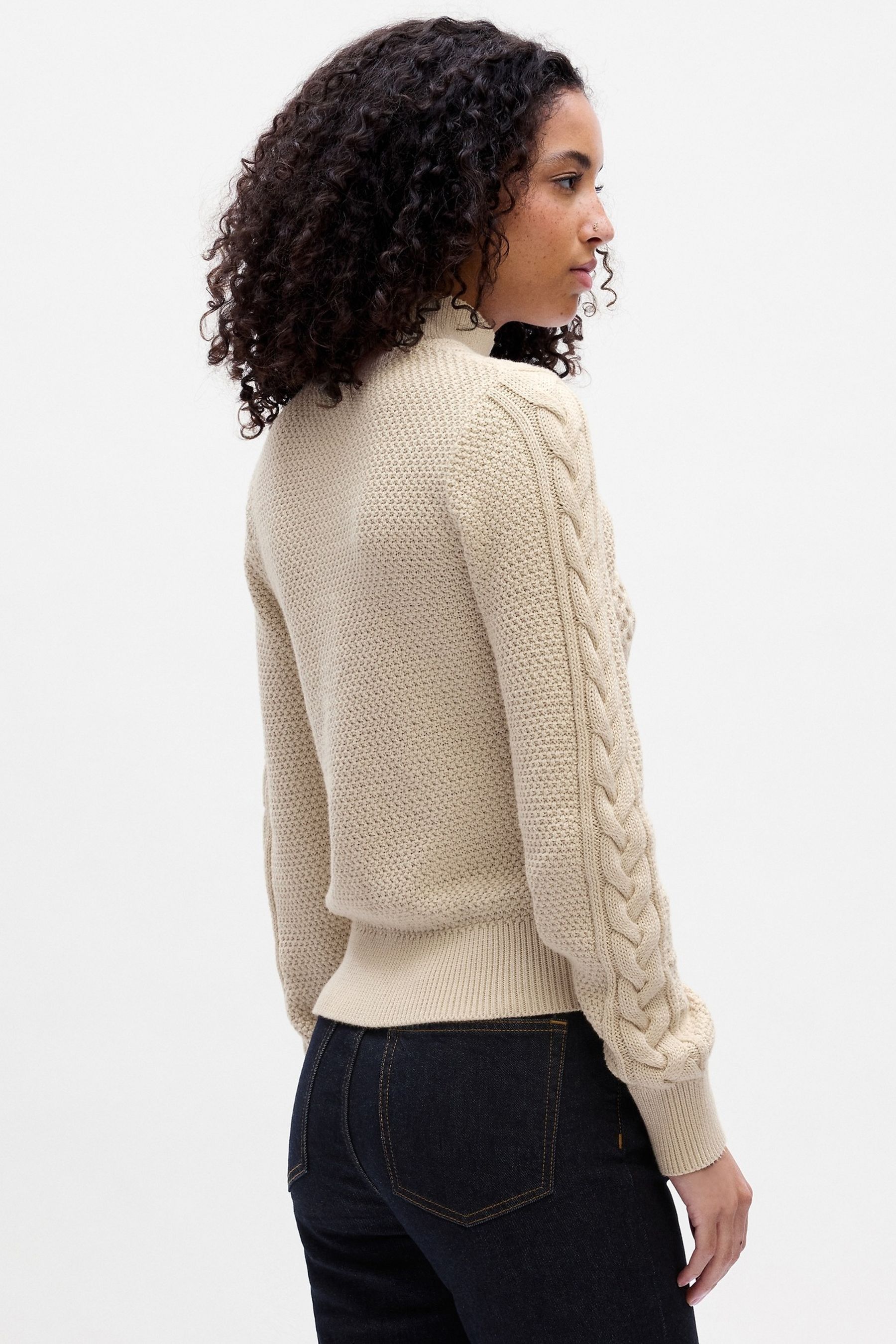 Buy Cream Relaxed Cable Knit Mock Neck Jumper from the Gap online shop
