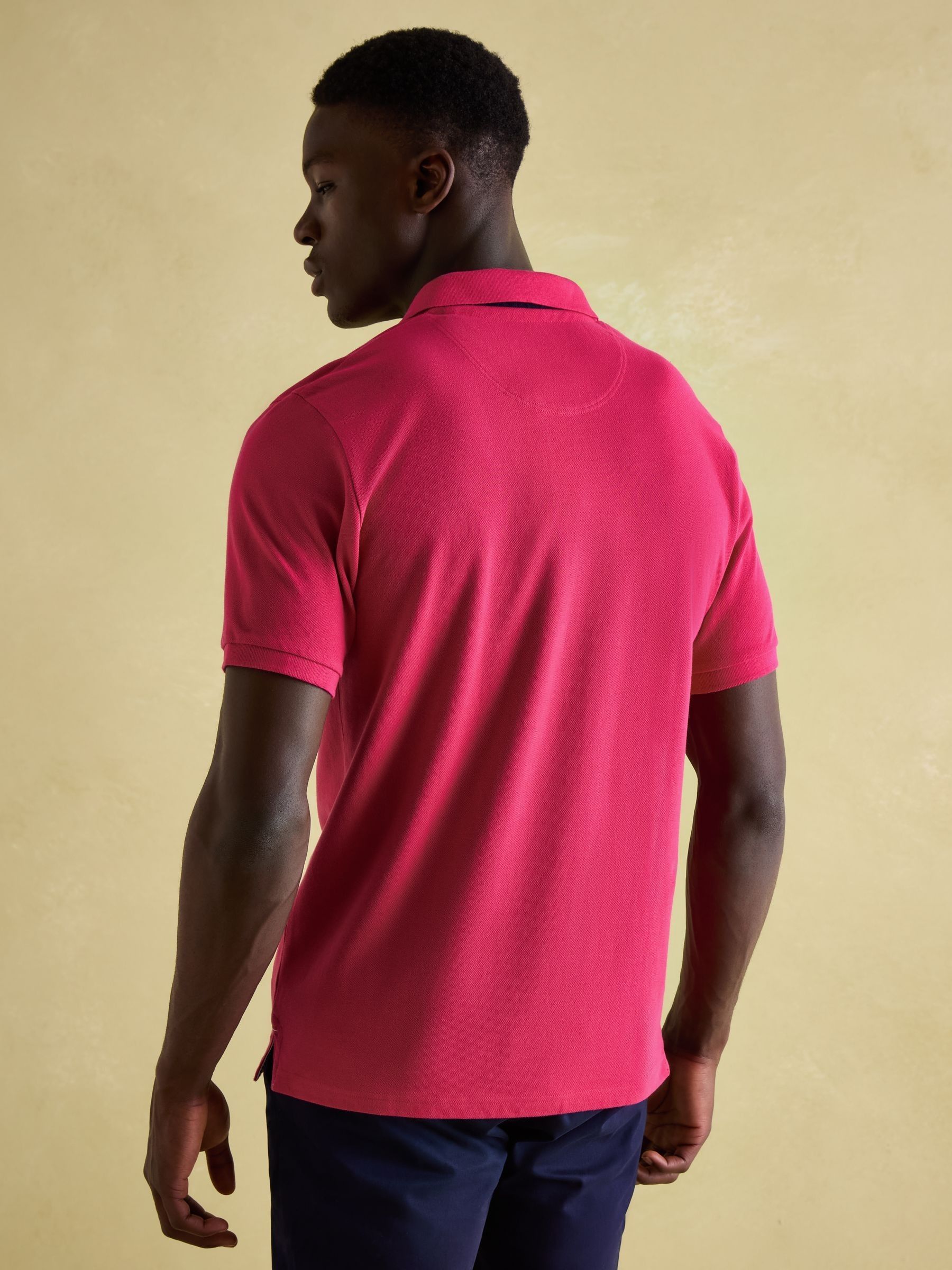 Woody Bright Pink Cotton Pique Polo Shirt | Joules