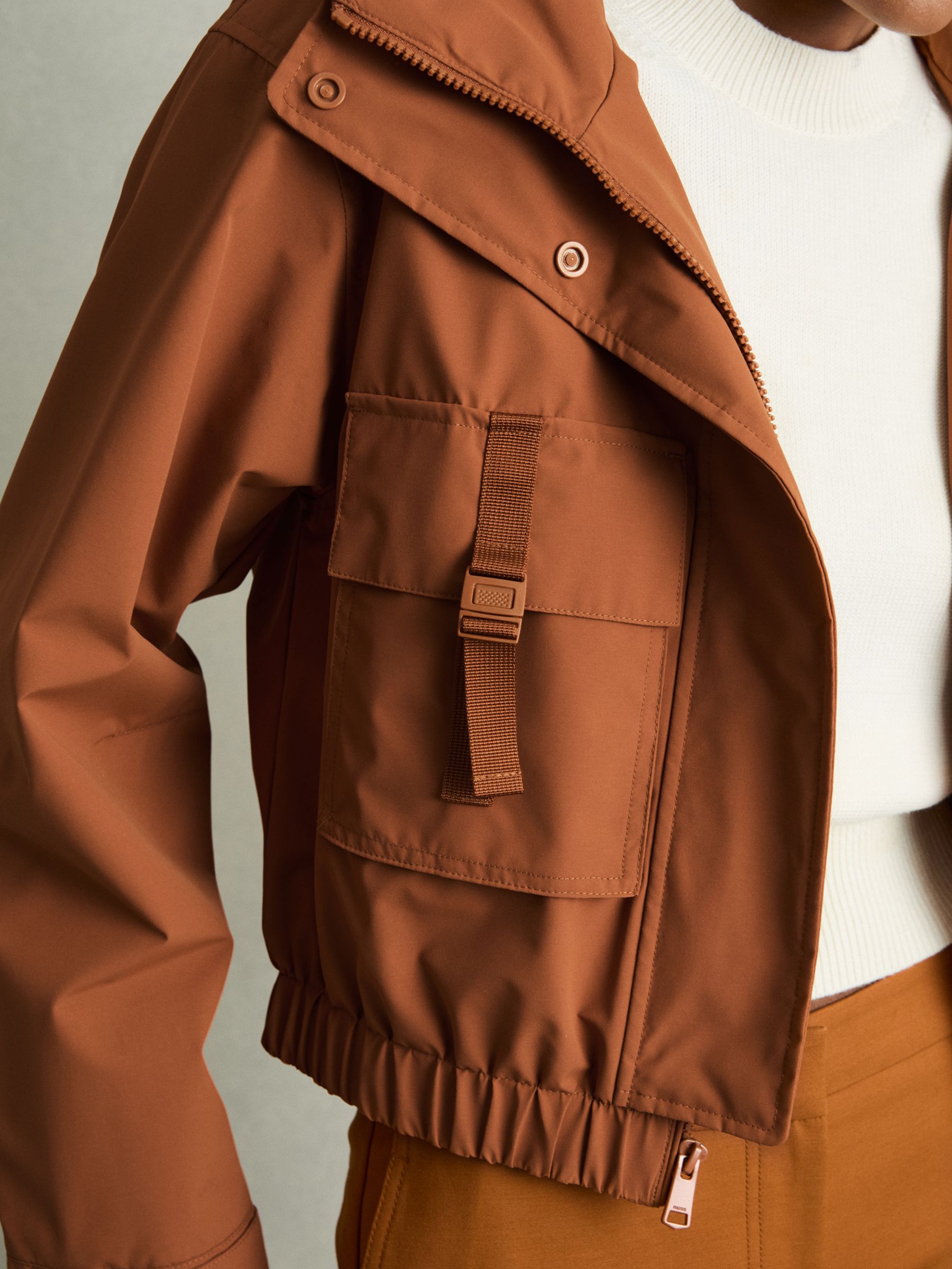 Reiss Technical Hooded Utility Jacket in Rust | REISS