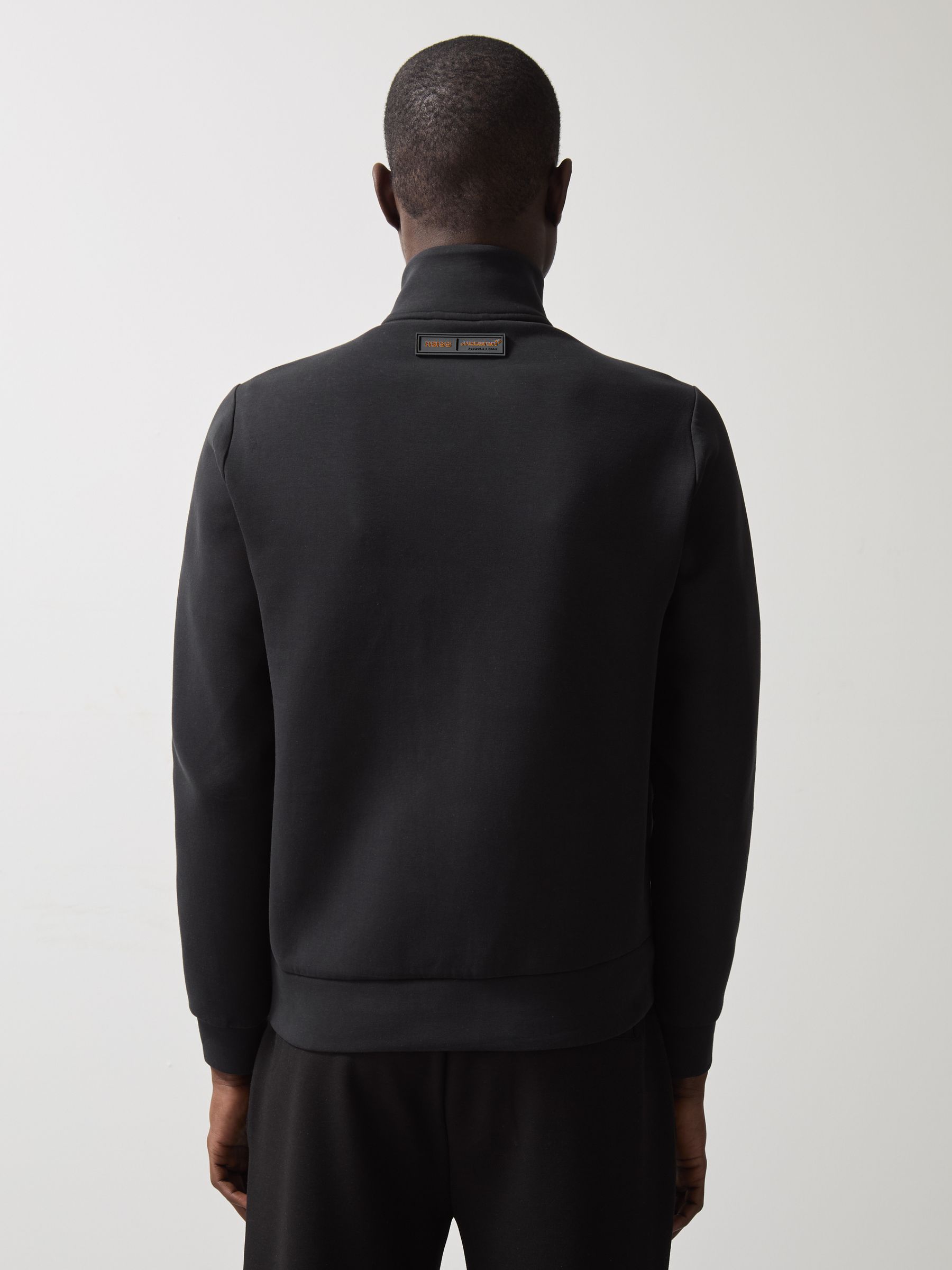 Reiss McLaren F1 Team Quilted Hybrid Jacket in Black | REISS