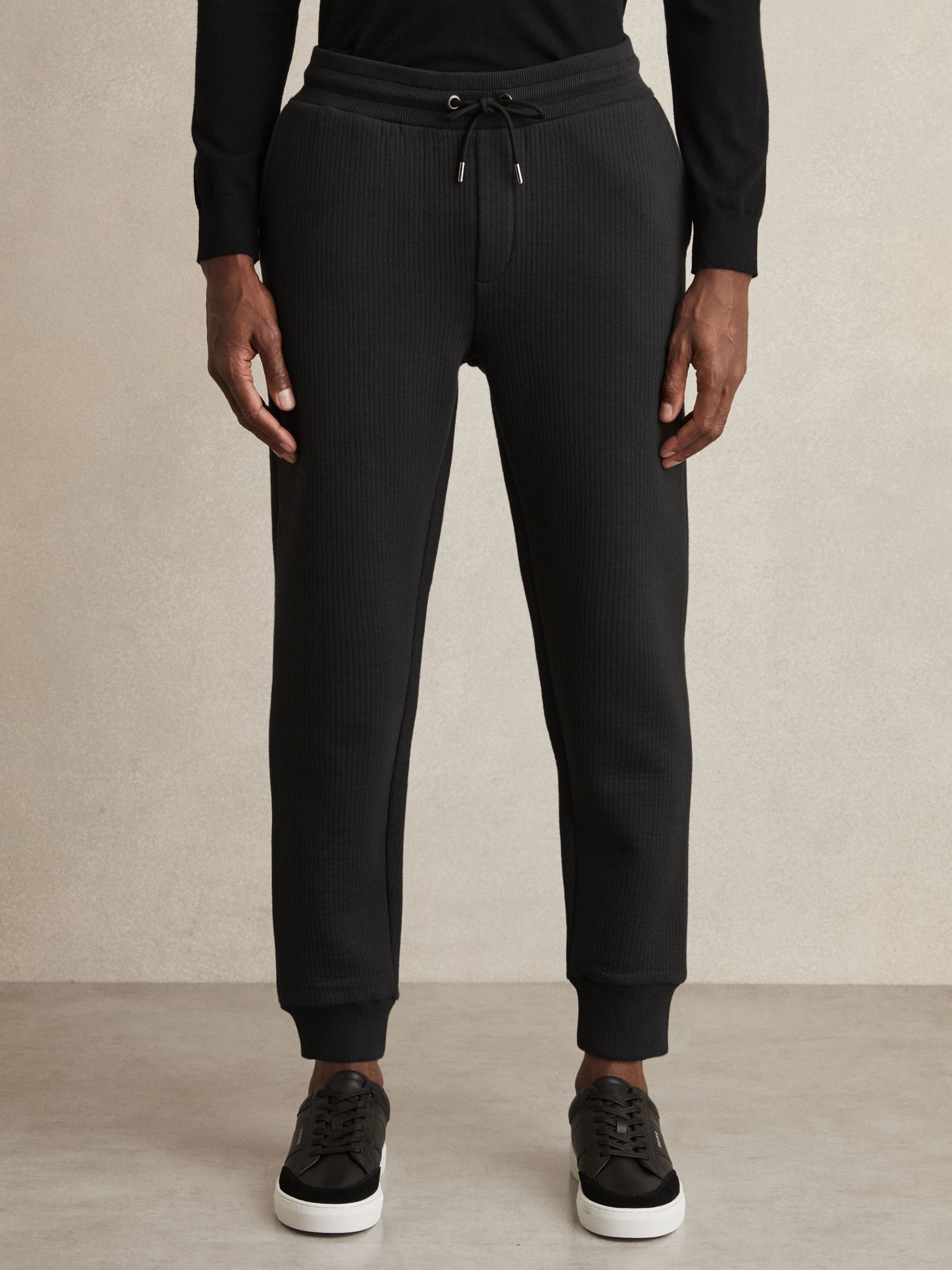 Reiss Cotton-Blend Ribbed Drawstring Joggers in Washed Black | REISS