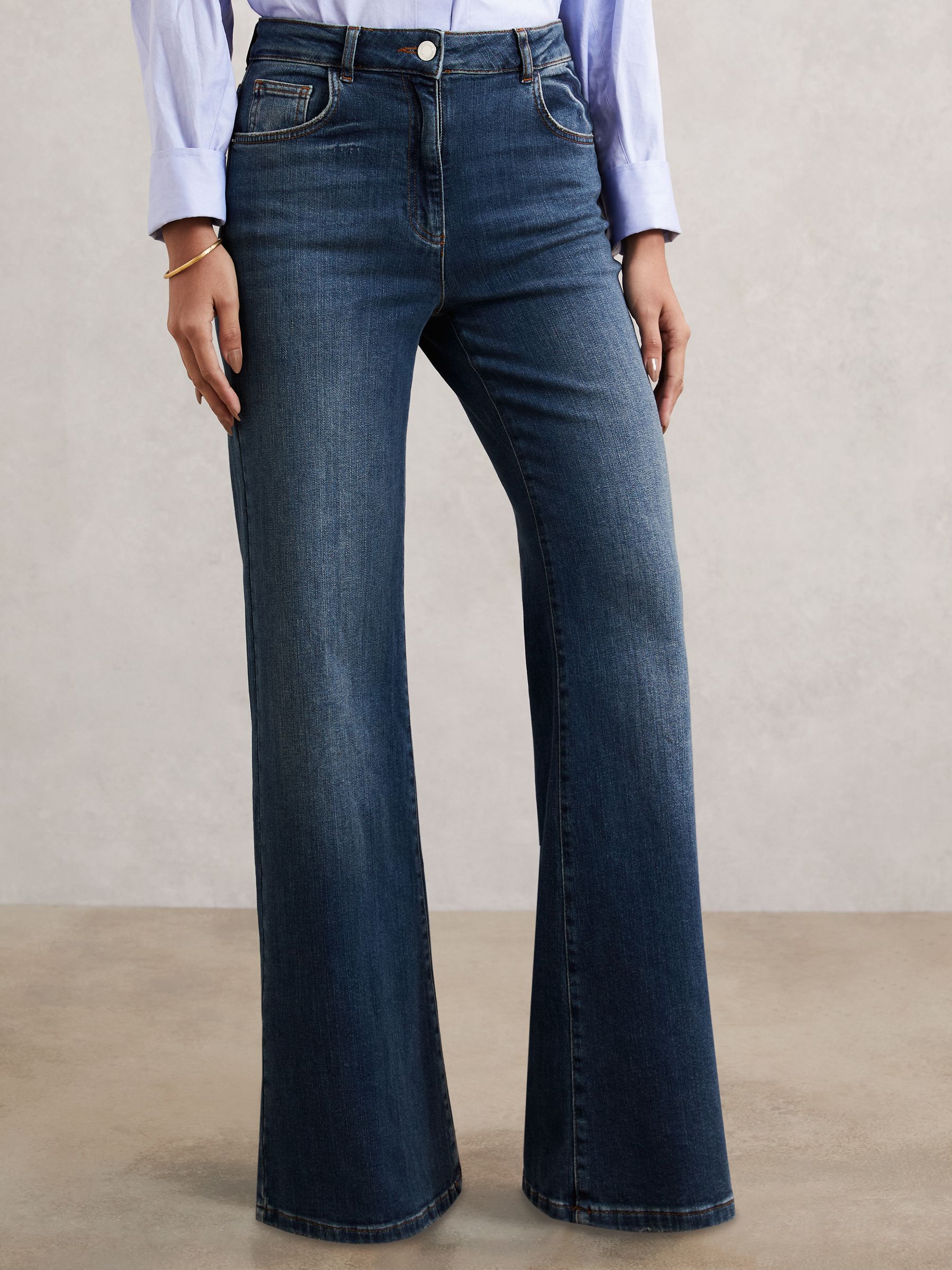 Reiss Petite Mid-Rise Flared Jeans in Mid Blue - REISS