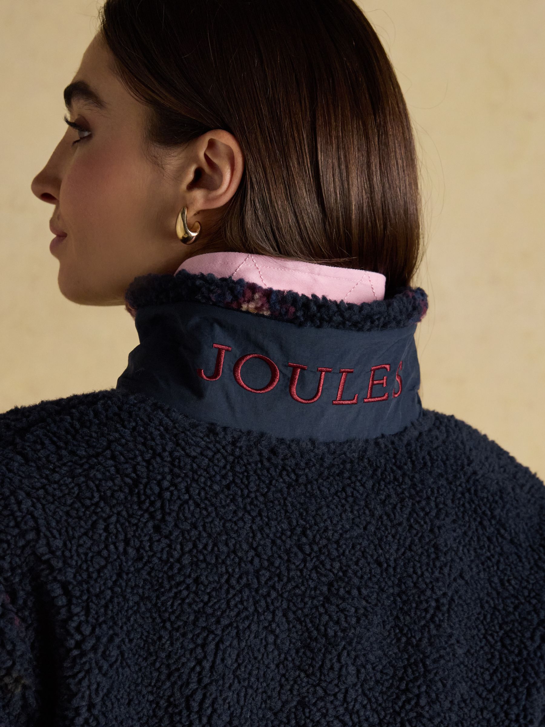 Lottie Navy/Red Geometric Print Borg Fleece with Zip Fastening | Joules