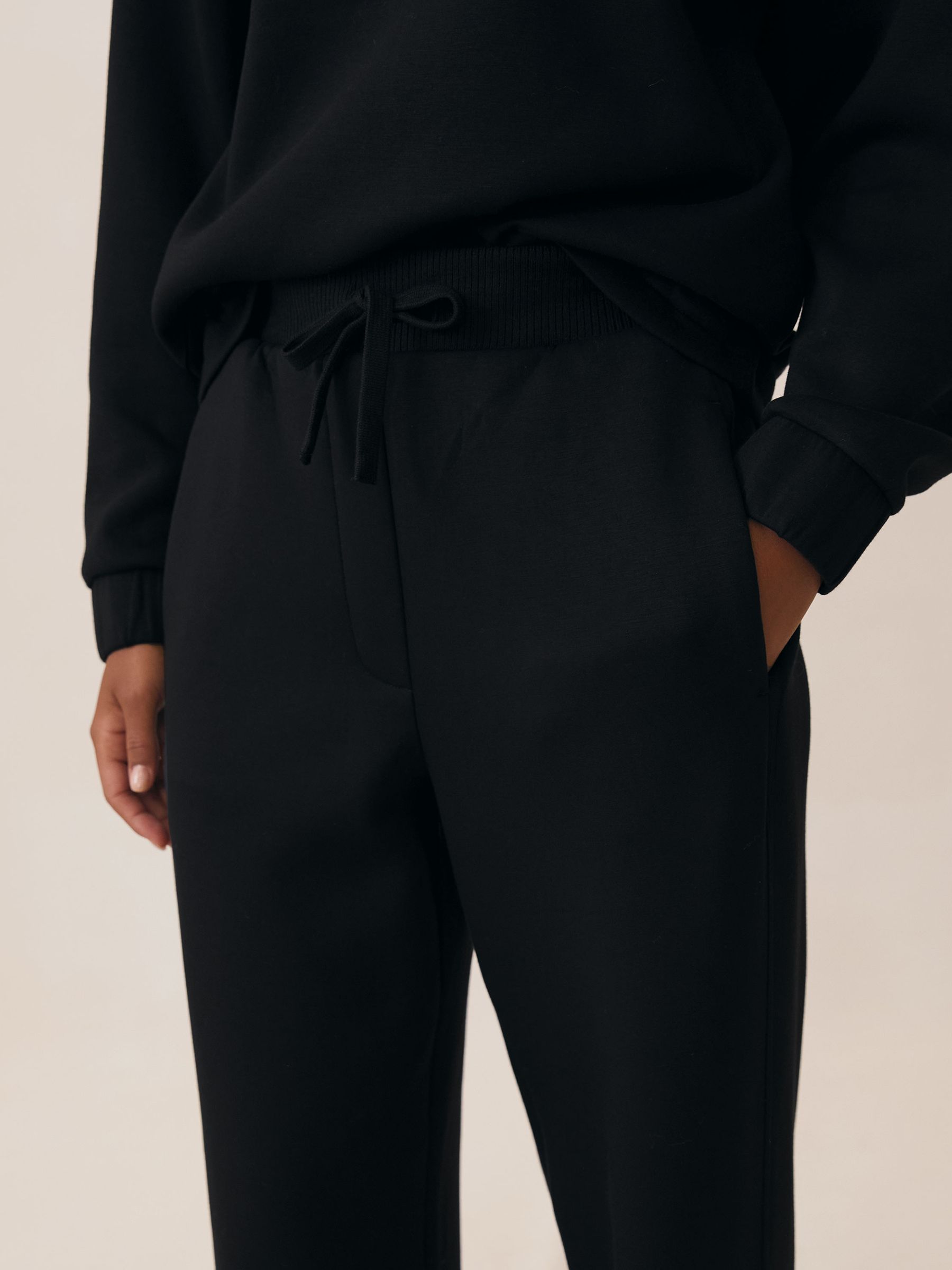 Reiss Petite Premium Interlock Wide-Leg Joggers in Black - REISS