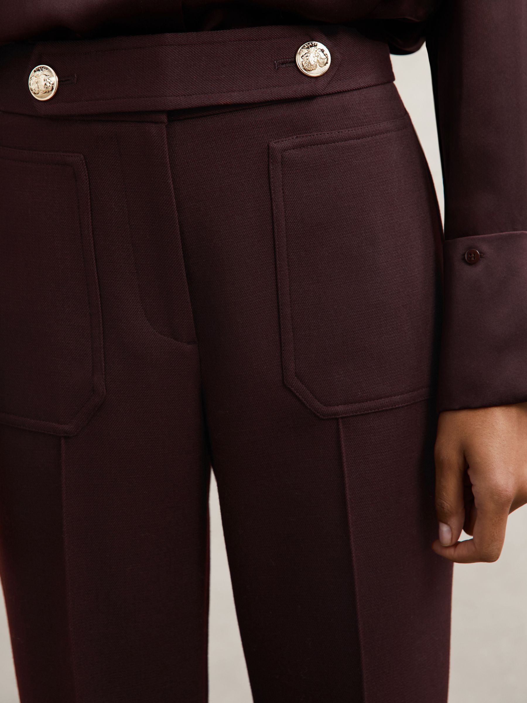 Reiss Petite Twill Button-Tab Flared Trousers With Wool in Burgundy | REISS