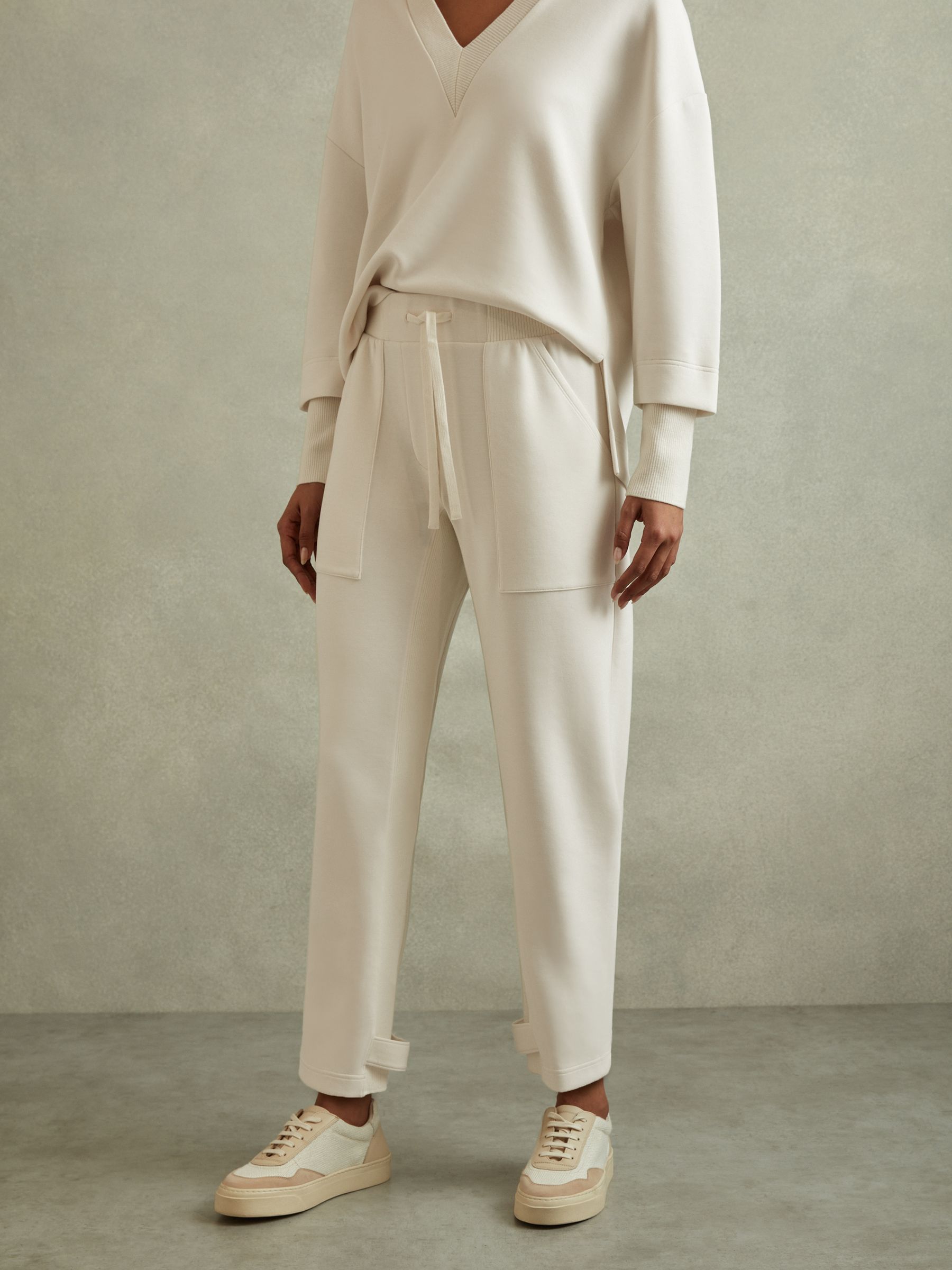 Reiss Tapered Drawstring Joggers in Cream - REISS