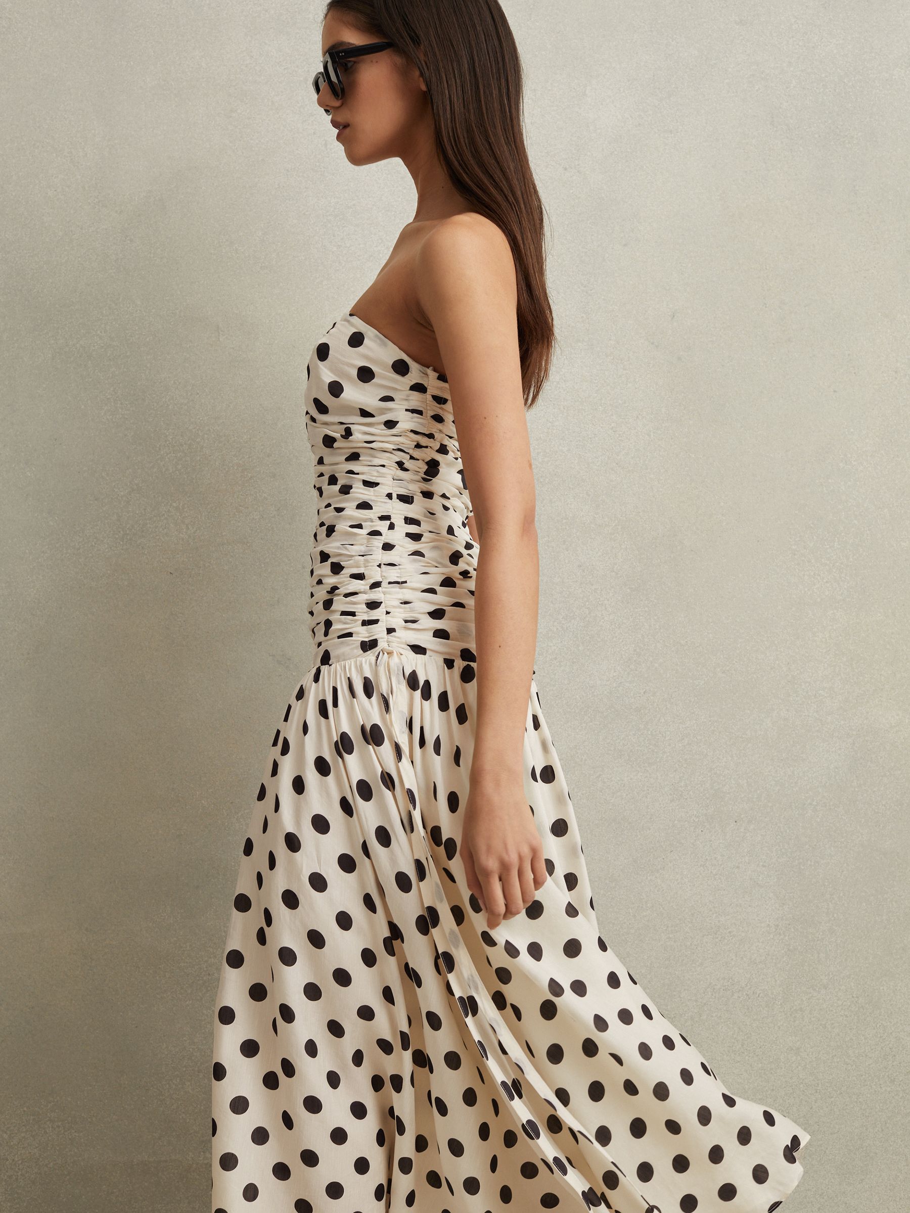 white with black spot dress