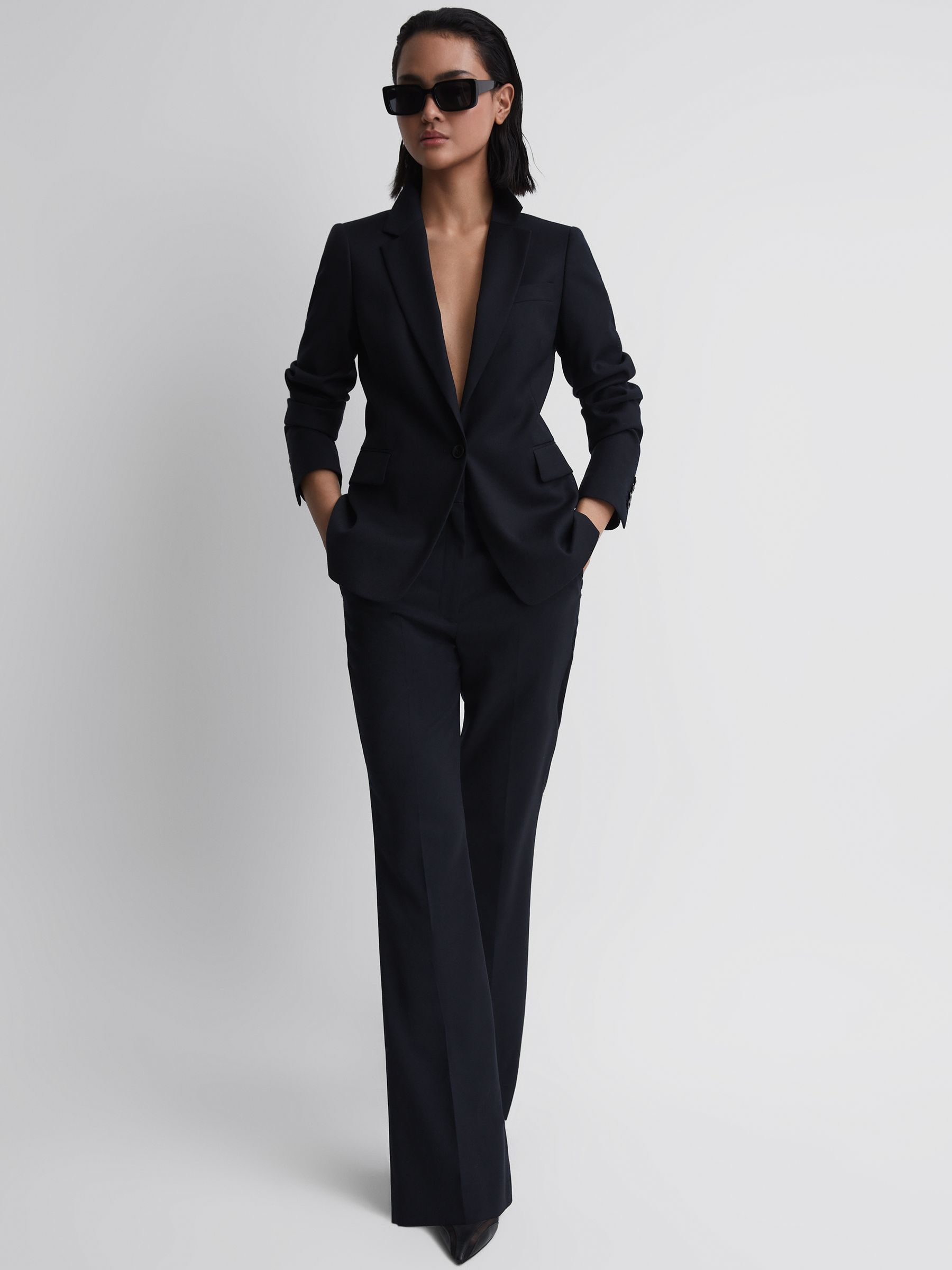 Petite Tailored Flared Suit Trousers in Navy - REISS