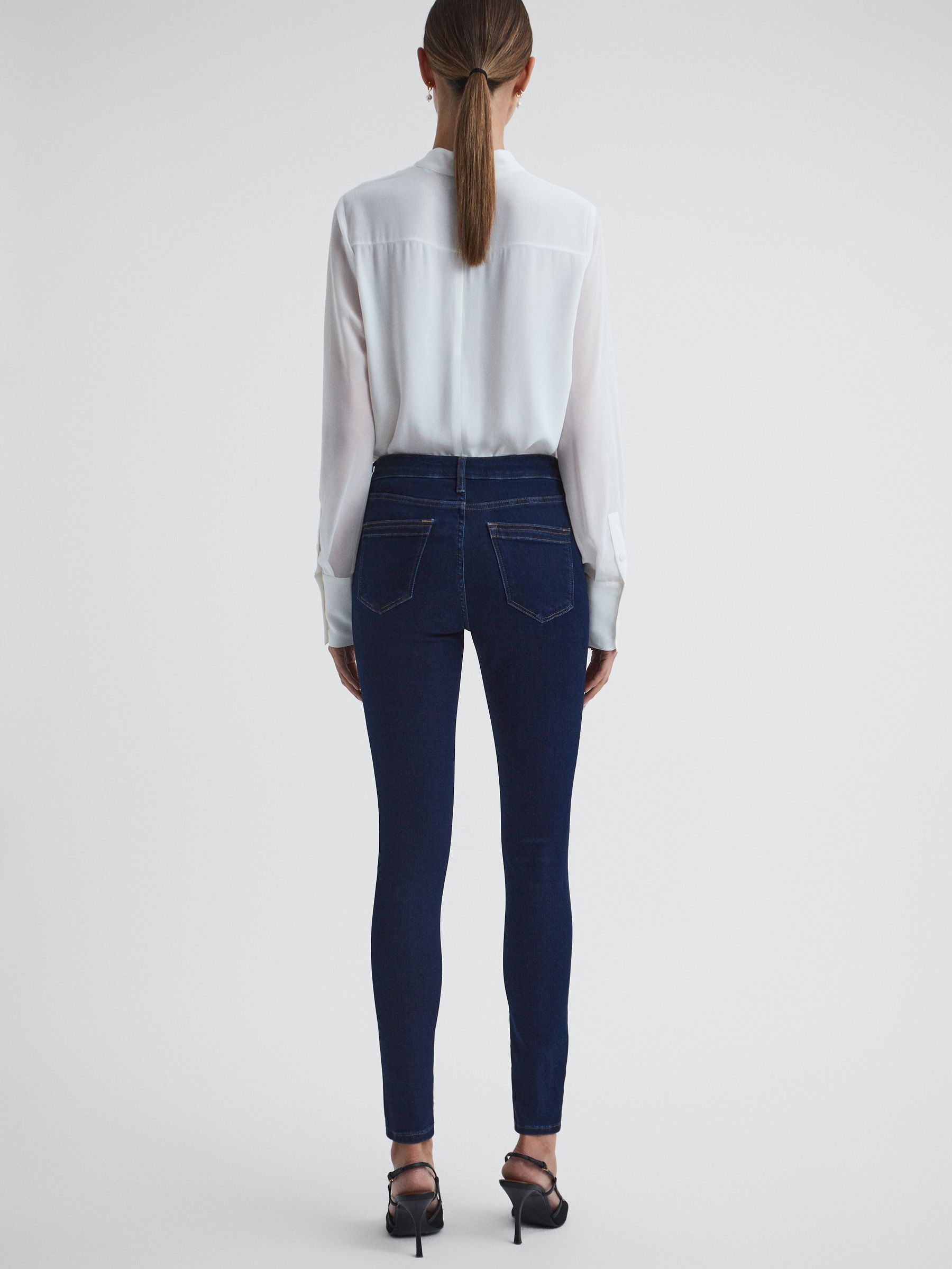 Reiss Indigo Lux Petite Mid Rise Skinny Jeans | REISS USA