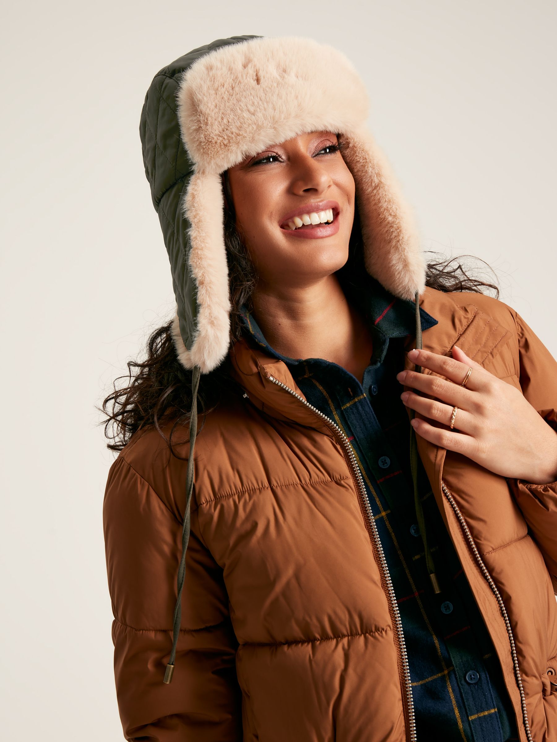 Buy Eira Green Faux Fur Lined Trapper Hat from the Joules online shop